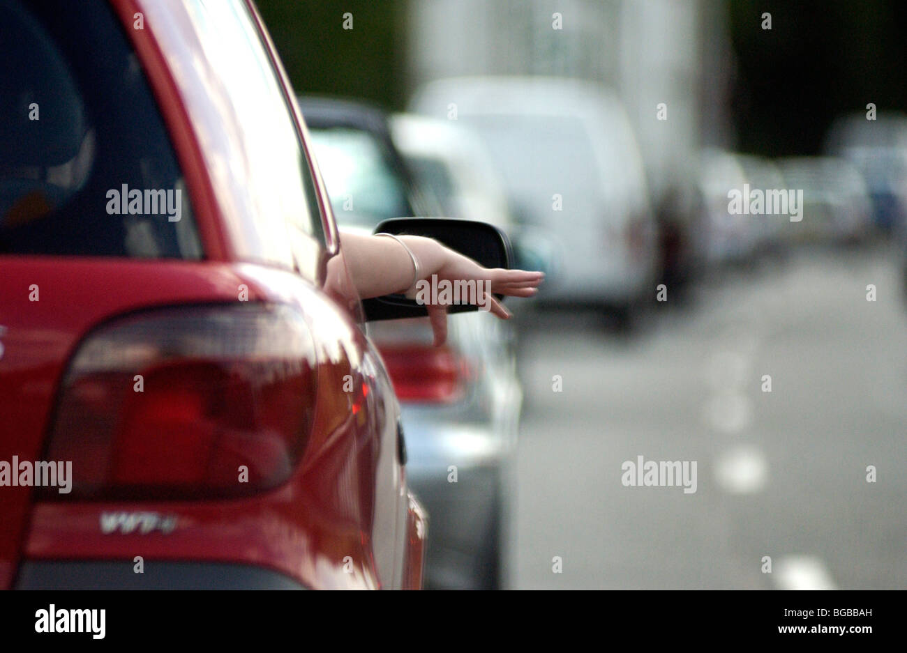 Royalty free photograph of woman in traffic jam congestion delay ...