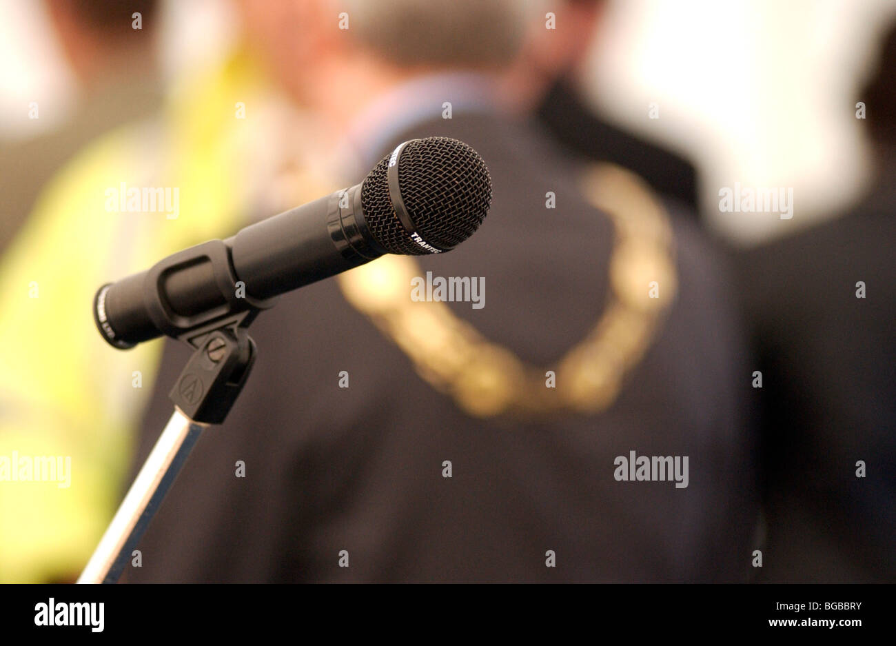 Royalty free photograph of a microphone at a public event with local ...