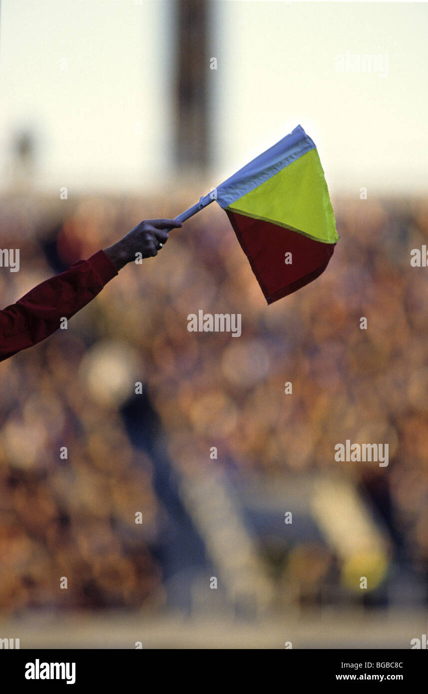 Rugby referee waves a flag Stock Photo - Alamy