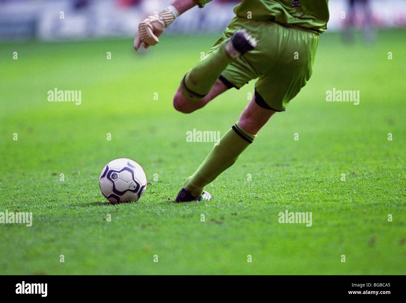 Goalkeeper kicking the ball Stock Photo - Alamy