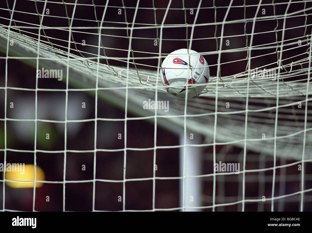 Football lands on top of a goal Stock Photo - Alamy
