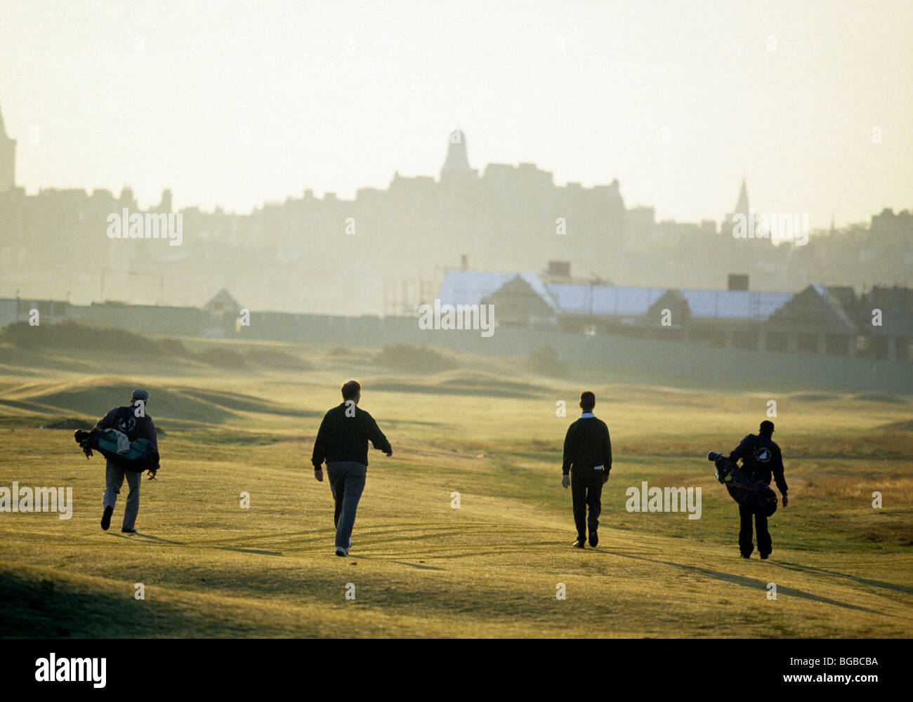 Golfers With Caddies Stock Photos & Golfers With Caddies Stock Images ...