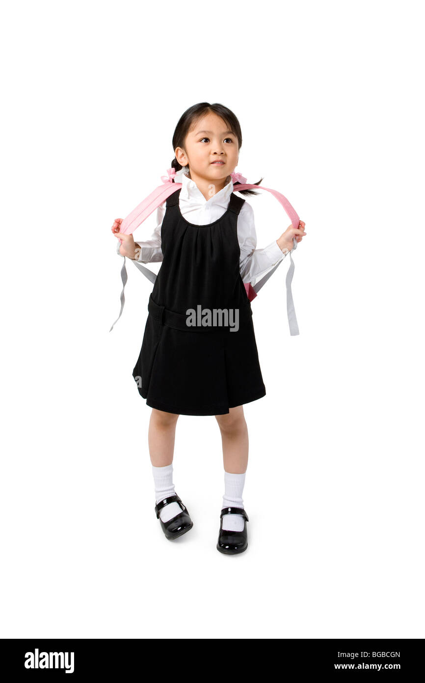 Little girls uniform backpack Cut Out Stock Images & Pictures - Alamy