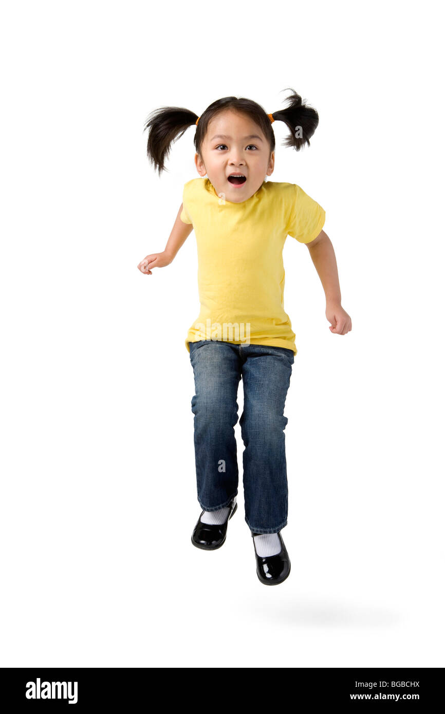 Little girl jumps Stock Photo - Alamy
