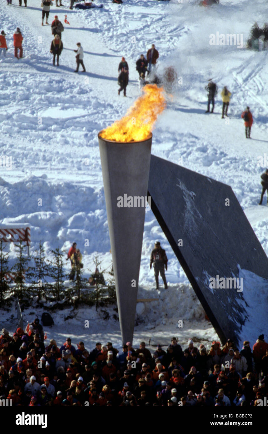 Crowd by winter Olympic torch Stock Photo - Alamy