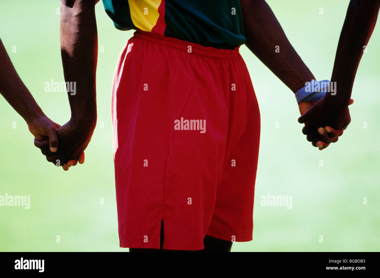 Football friendship teamwork before a match Stock Photo - Alamy