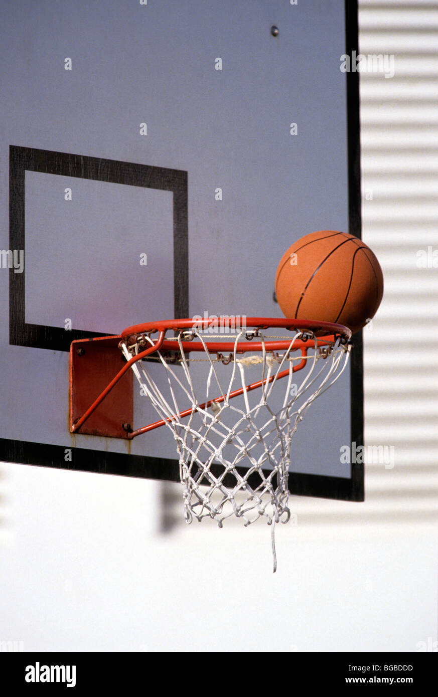 Basketball on the edge of the hoop Stock Photo - Alamy