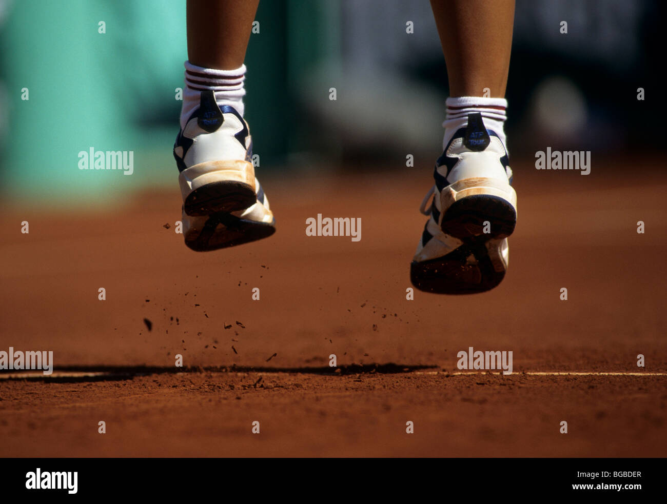 Tennis player on a clay court Stock Photo - Alamy