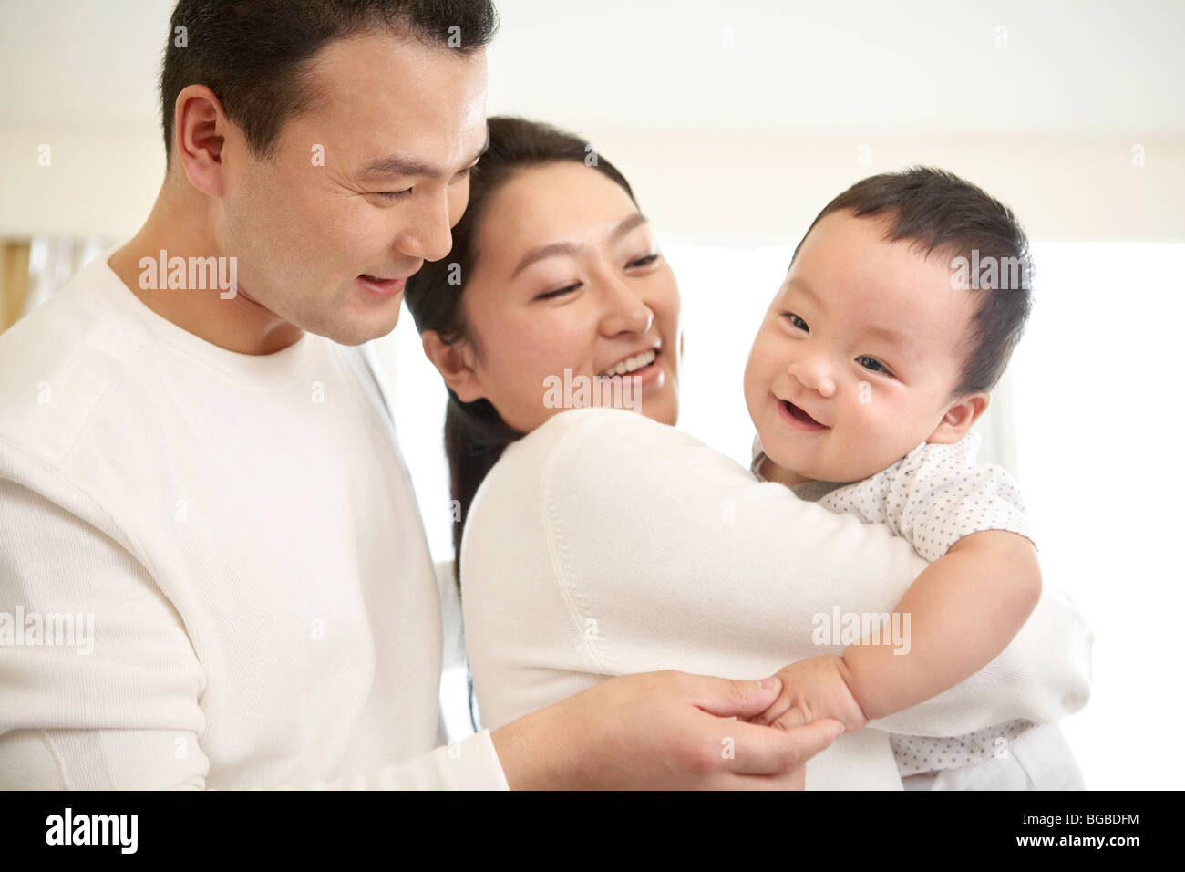 Family with child Stock Photo - Alamy