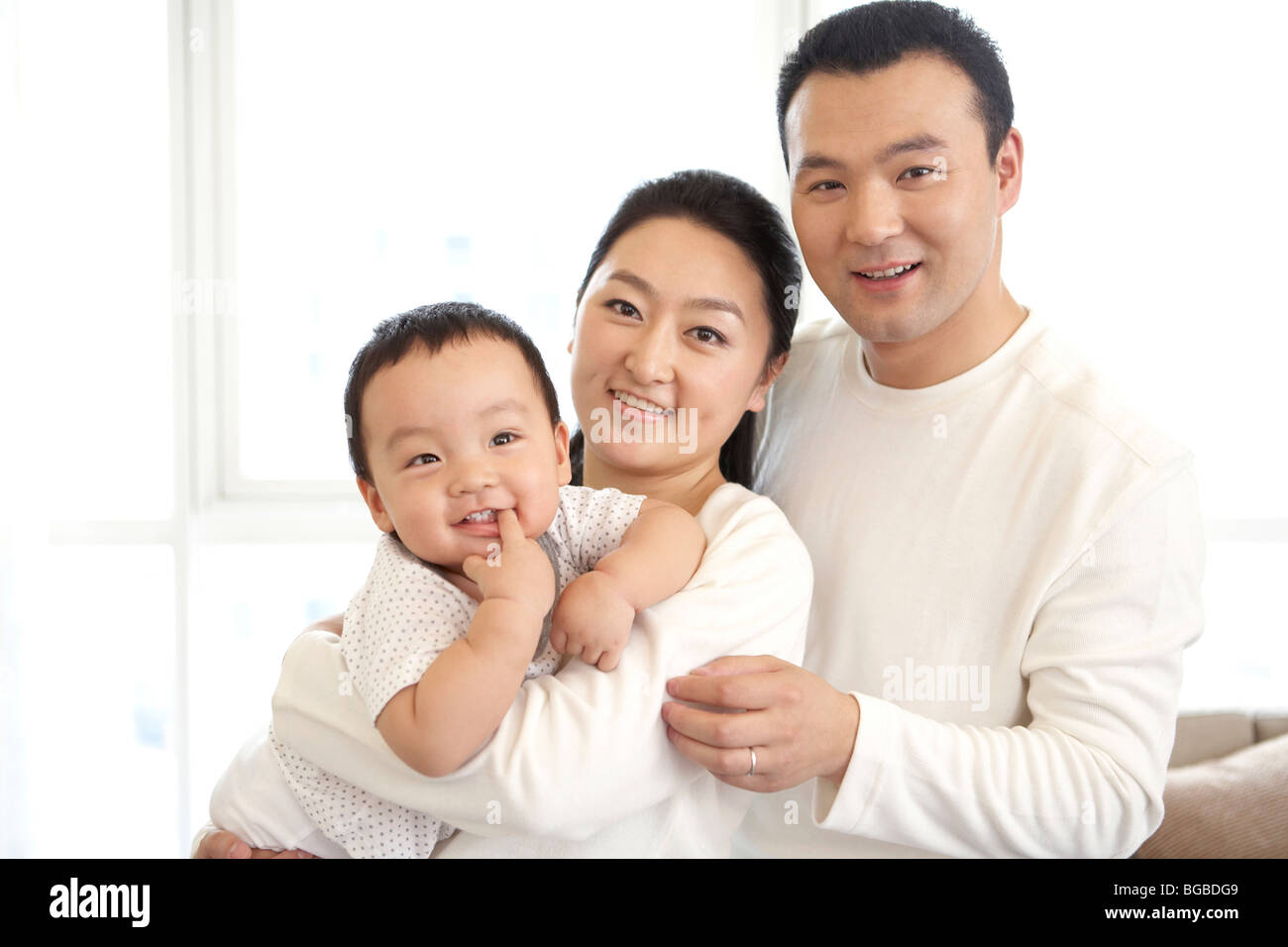 Family with child Stock Photo - Alamy