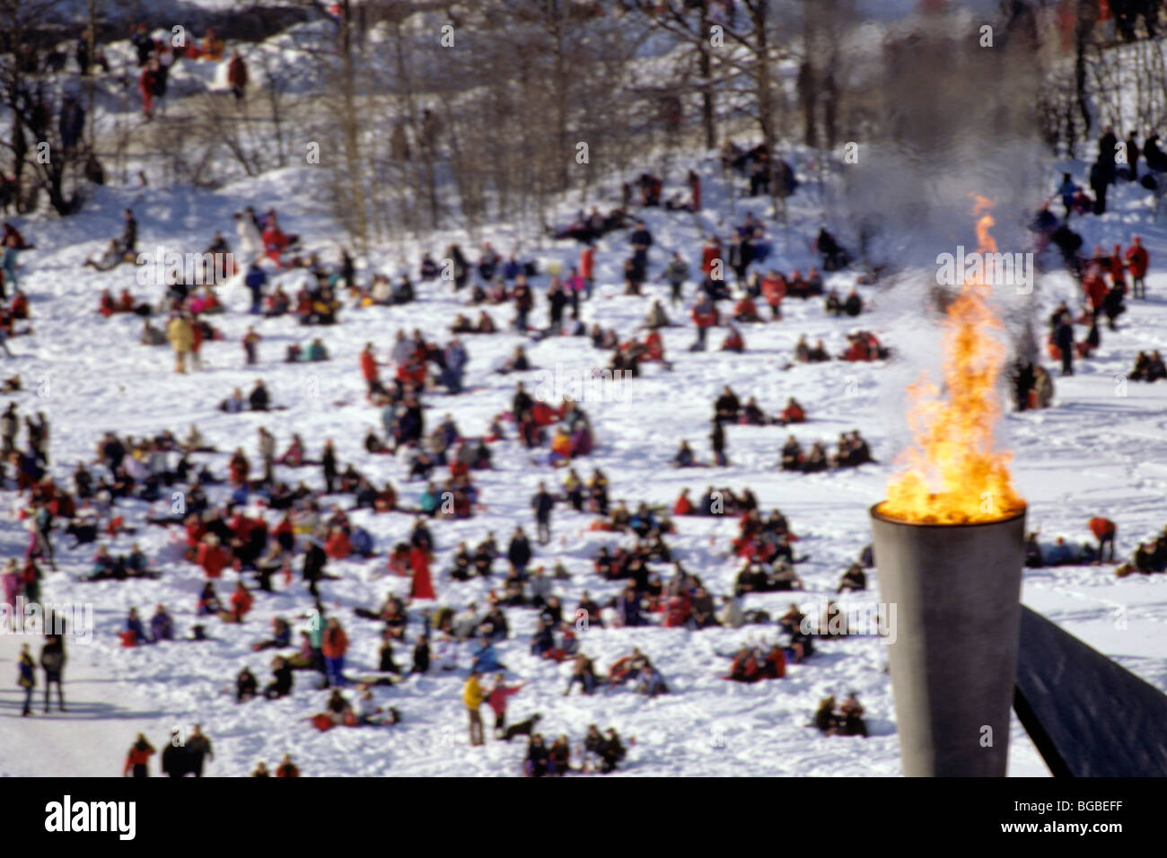 Crowd by winter Olympic torch Stock Photo - Alamy
