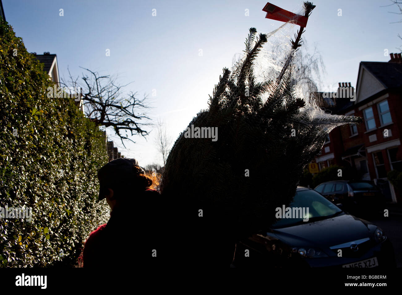 Carried over shoulder hi-res stock photography and images - Alamy