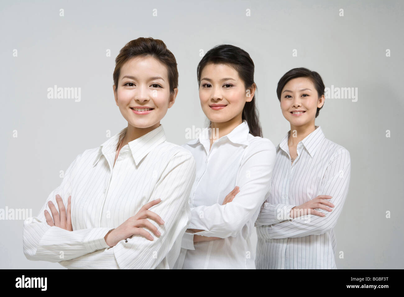 Three professional women Stock Photo - Alamy