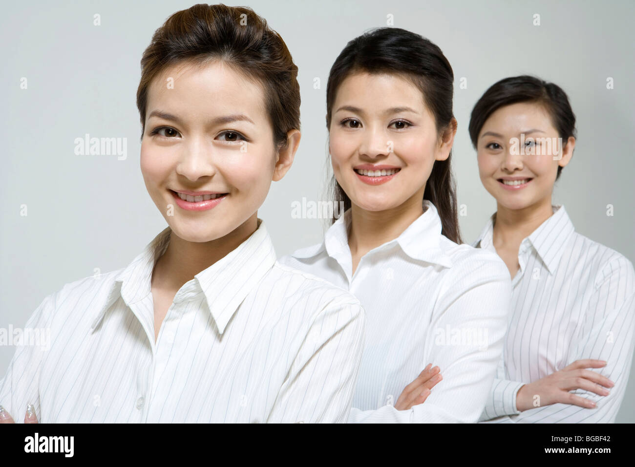Three professional women Stock Photo - Alamy