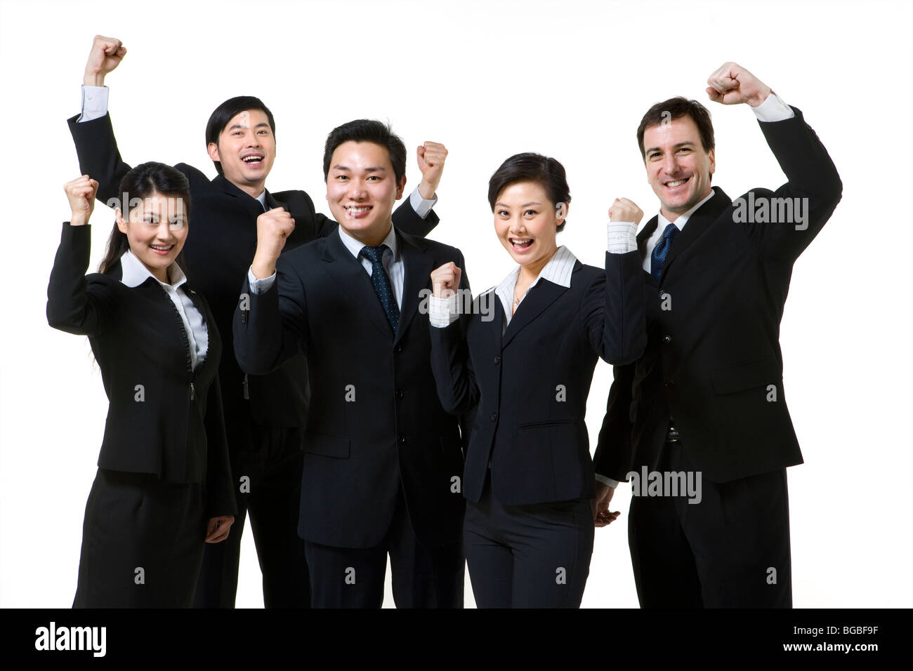 Excited business professionals on white background Stock Photo - Alamy