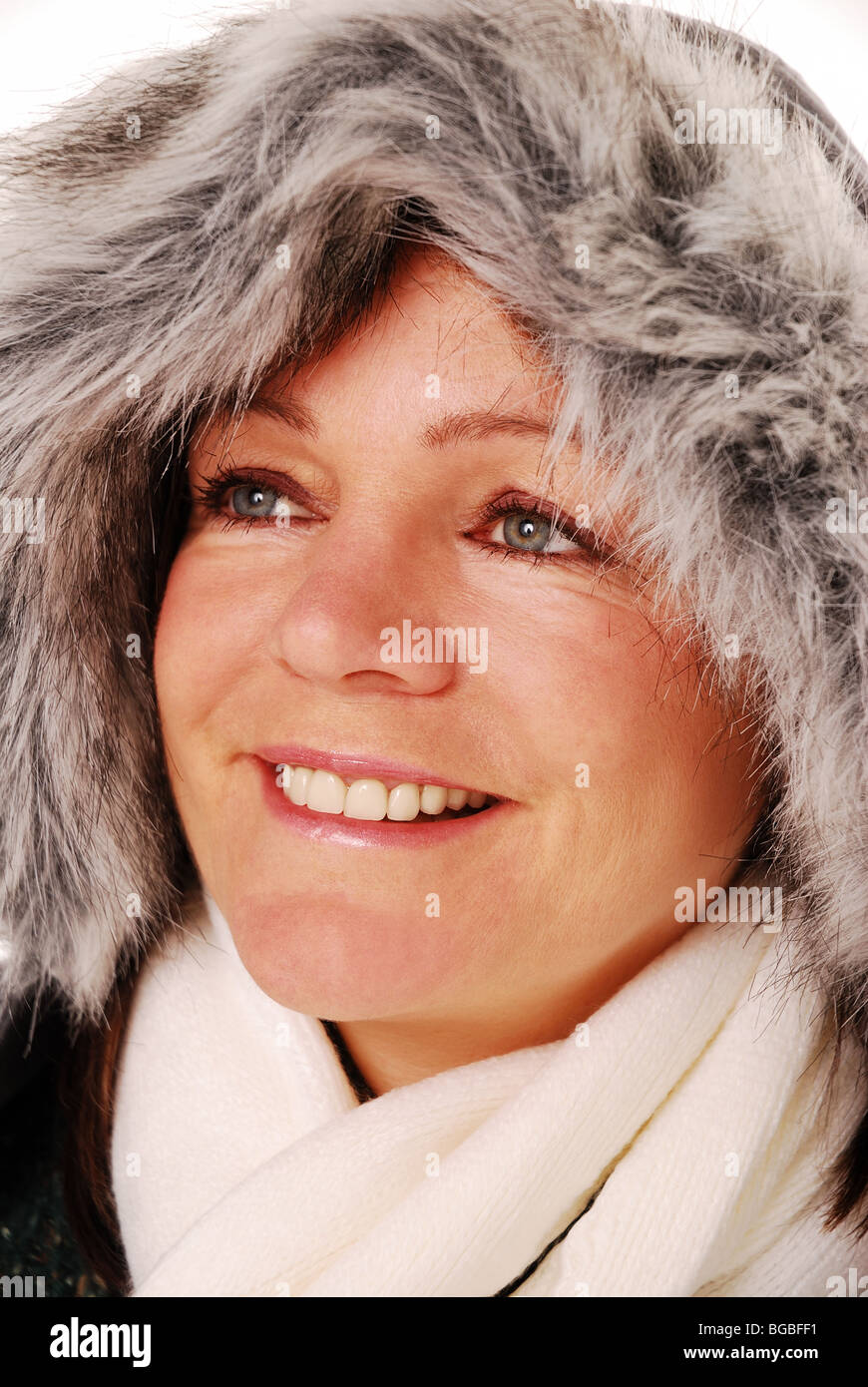 Woman wrapped up warm Stock Photo - Alamy