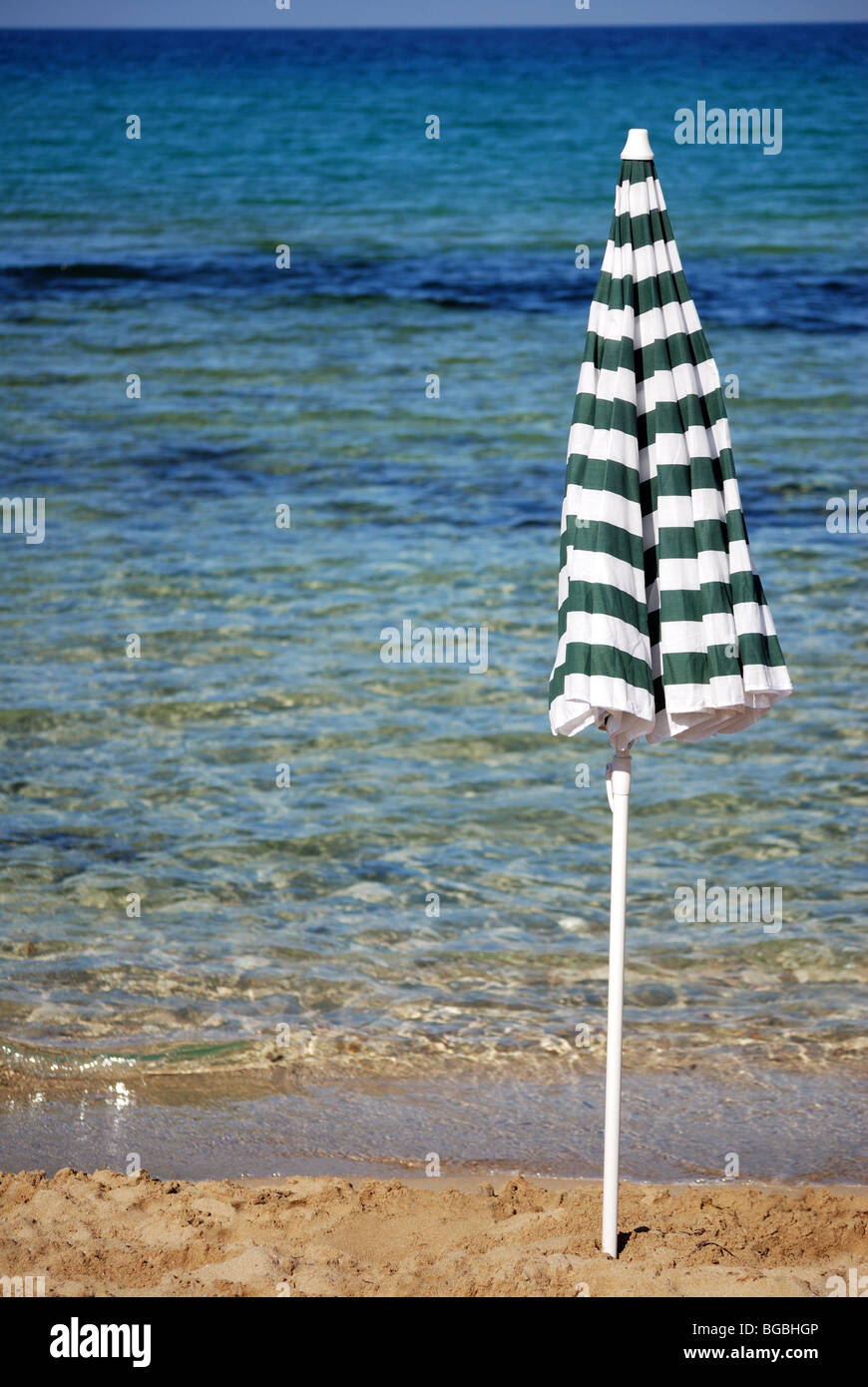 Parasol on a beach Stock Photo - Alamy