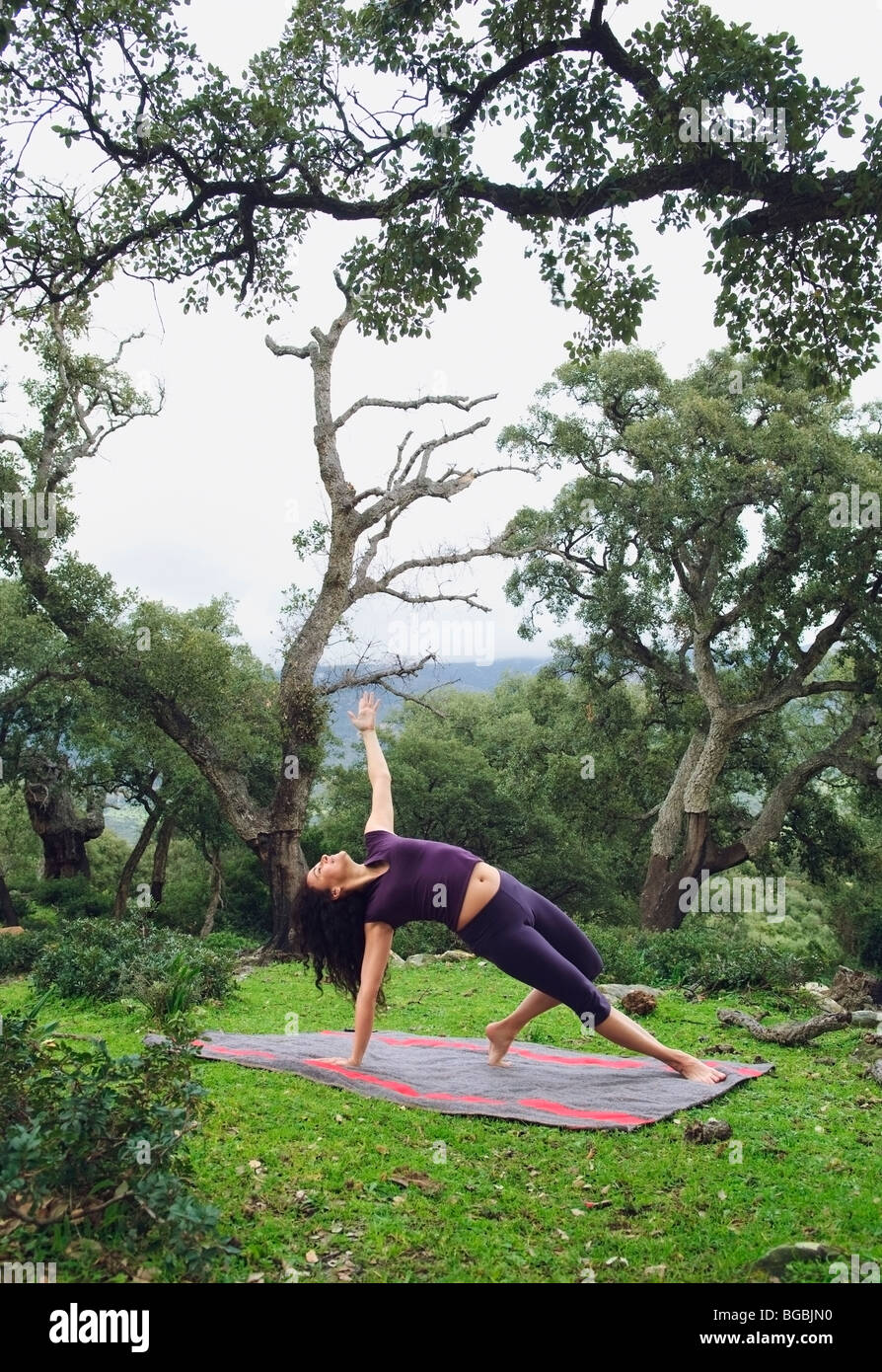 Woman stretching outside Stock Photo - Alamy