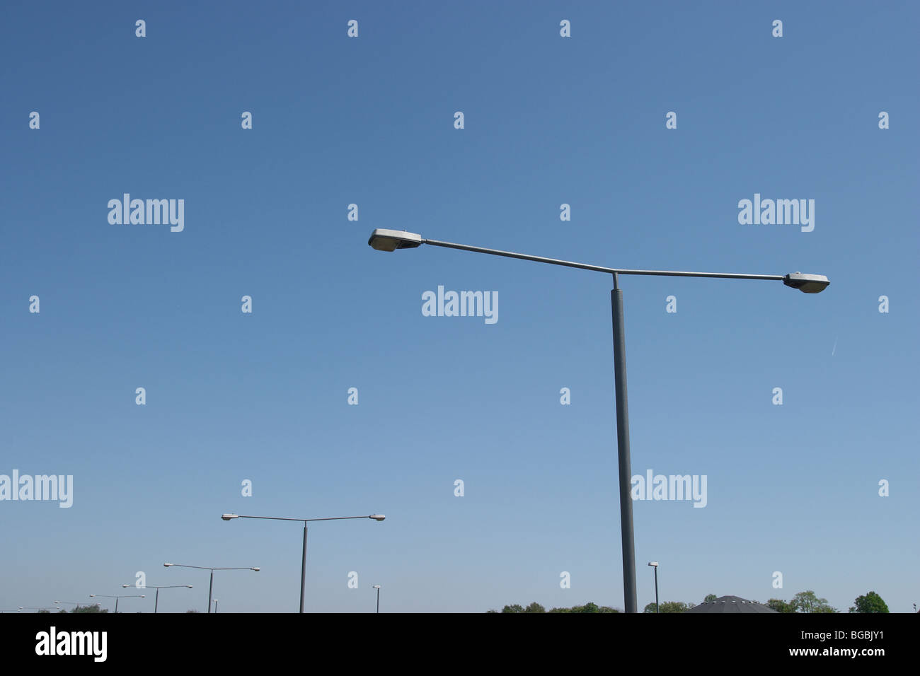 Motorway lamp posts Stock Photo - Alamy