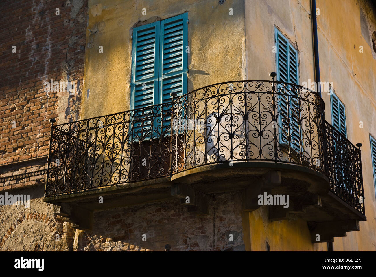 Corner balcony on apartment building, Cherasco, Piedmont, Italy Stock ...