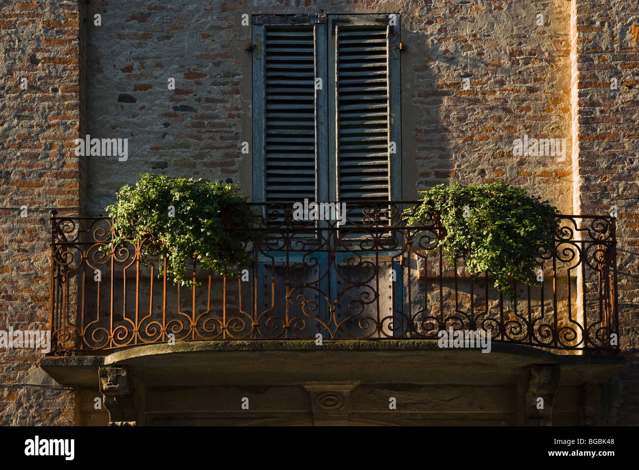 Balcony with plants on apartment building, Cherasco, Piedmont Stock ...