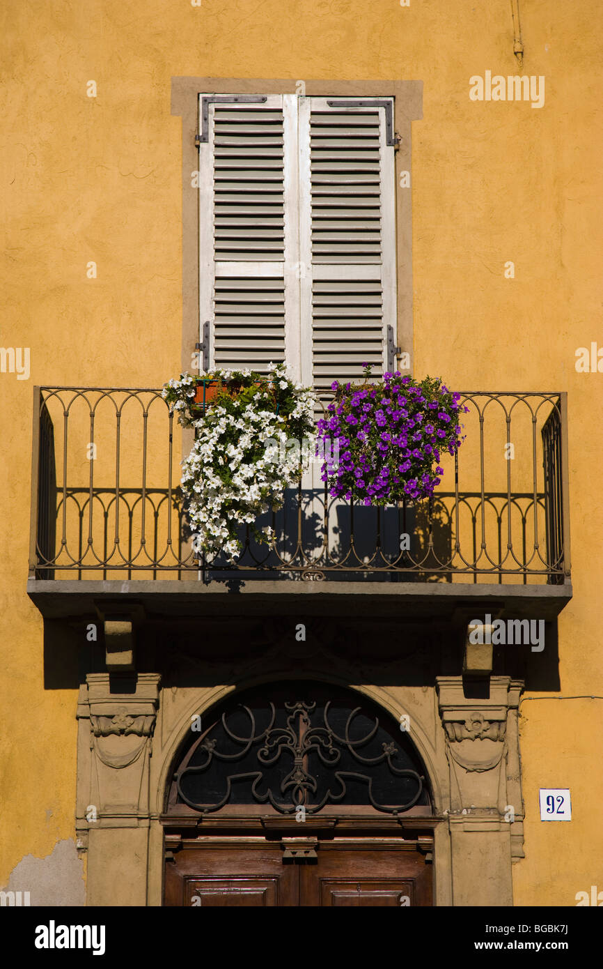 Balcony with plants on apartment building, Cherasco, Piedmont, Italy ...