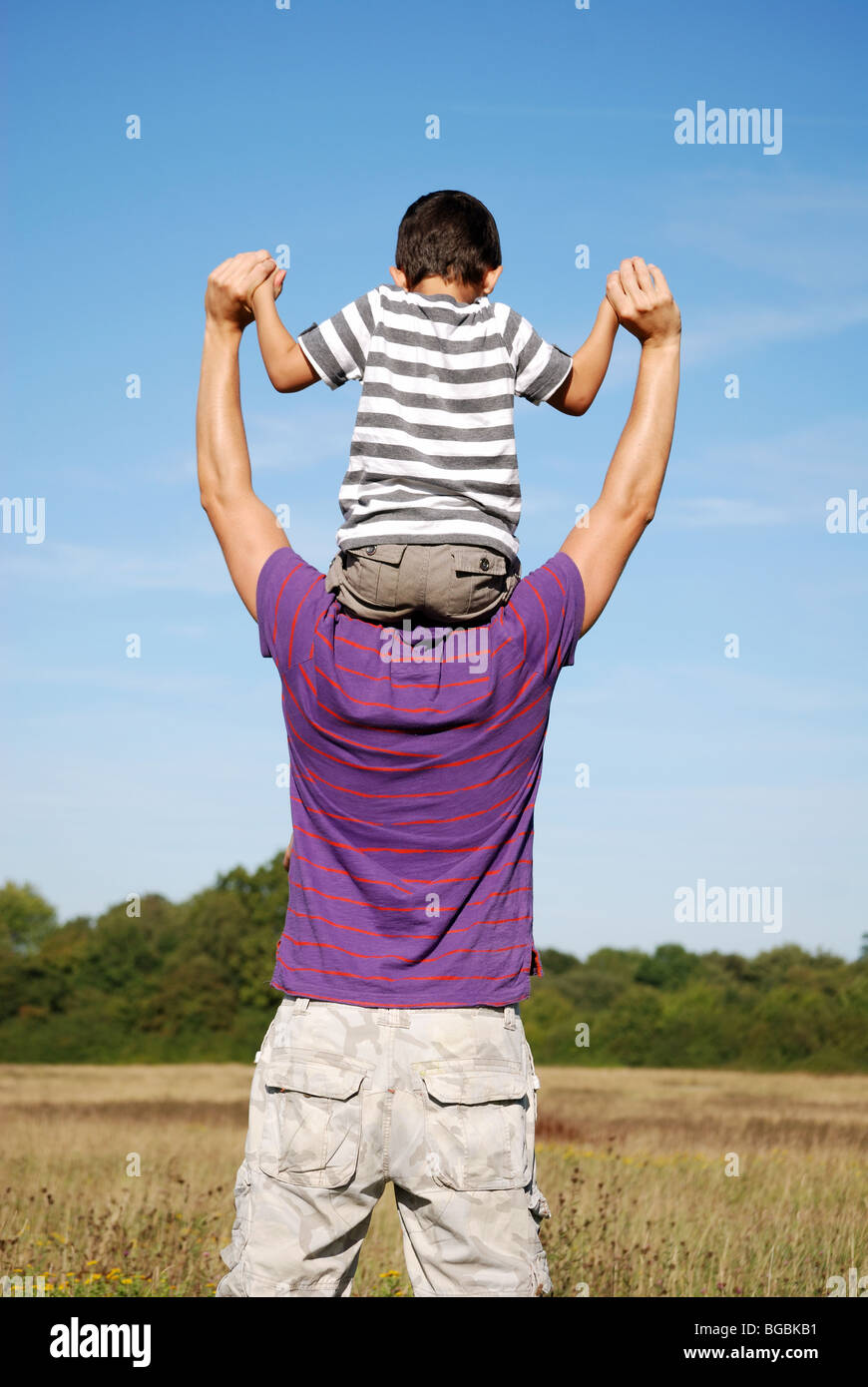 Man and child playing Stock Photo - Alamy