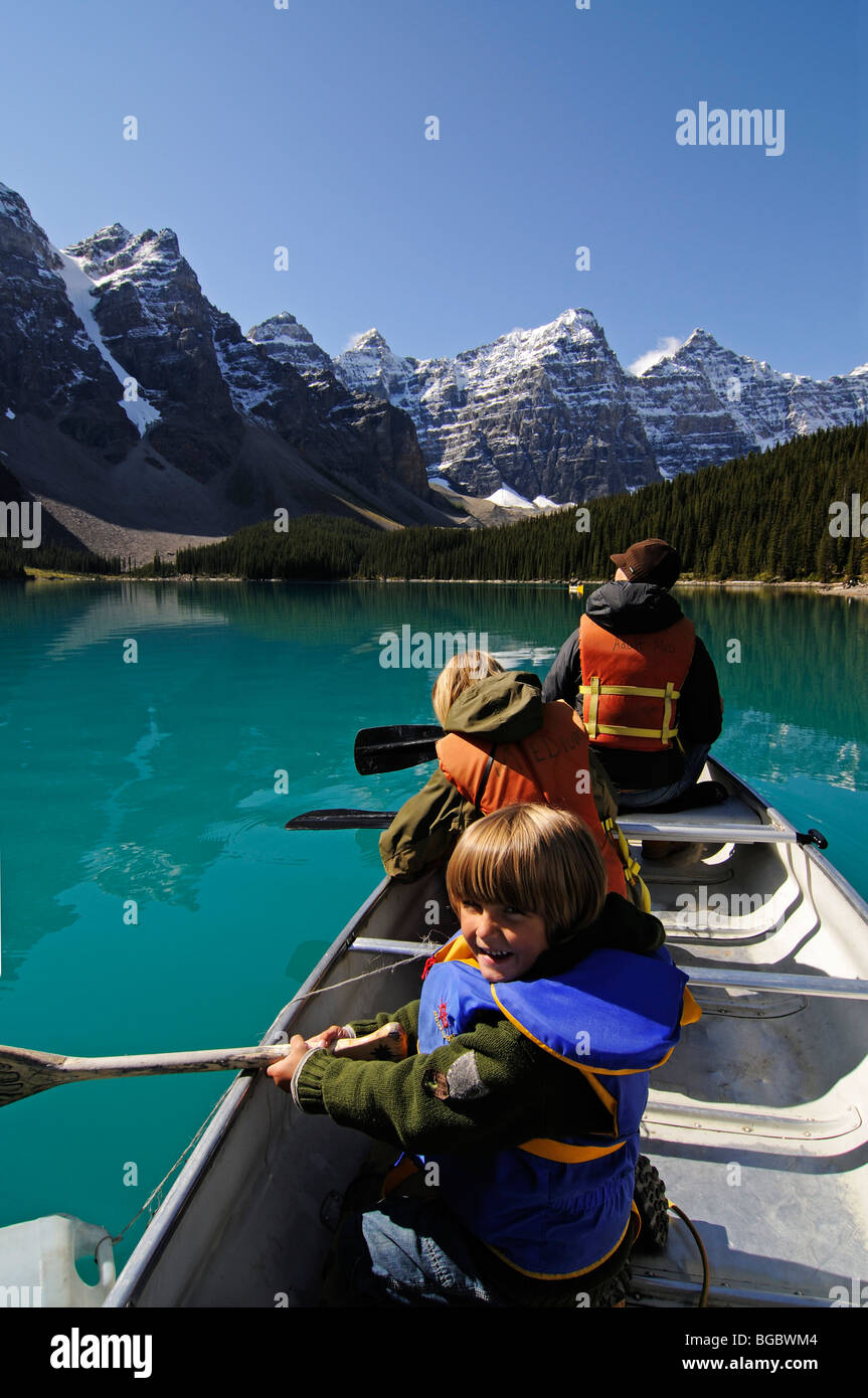 Family in canoe, Moraine Lake, Banff National Park, Alberta, Canada Stock Photo - Alamy
