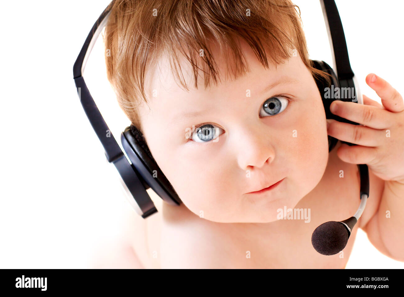 portrait of baby with headset on white background Stock Photo - Alamy