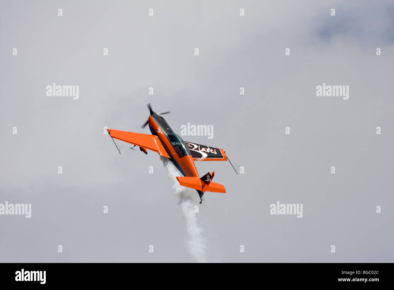 The Blades Aerobatic team flying Extra 300 LP aircraft Stock Photo - Alamy