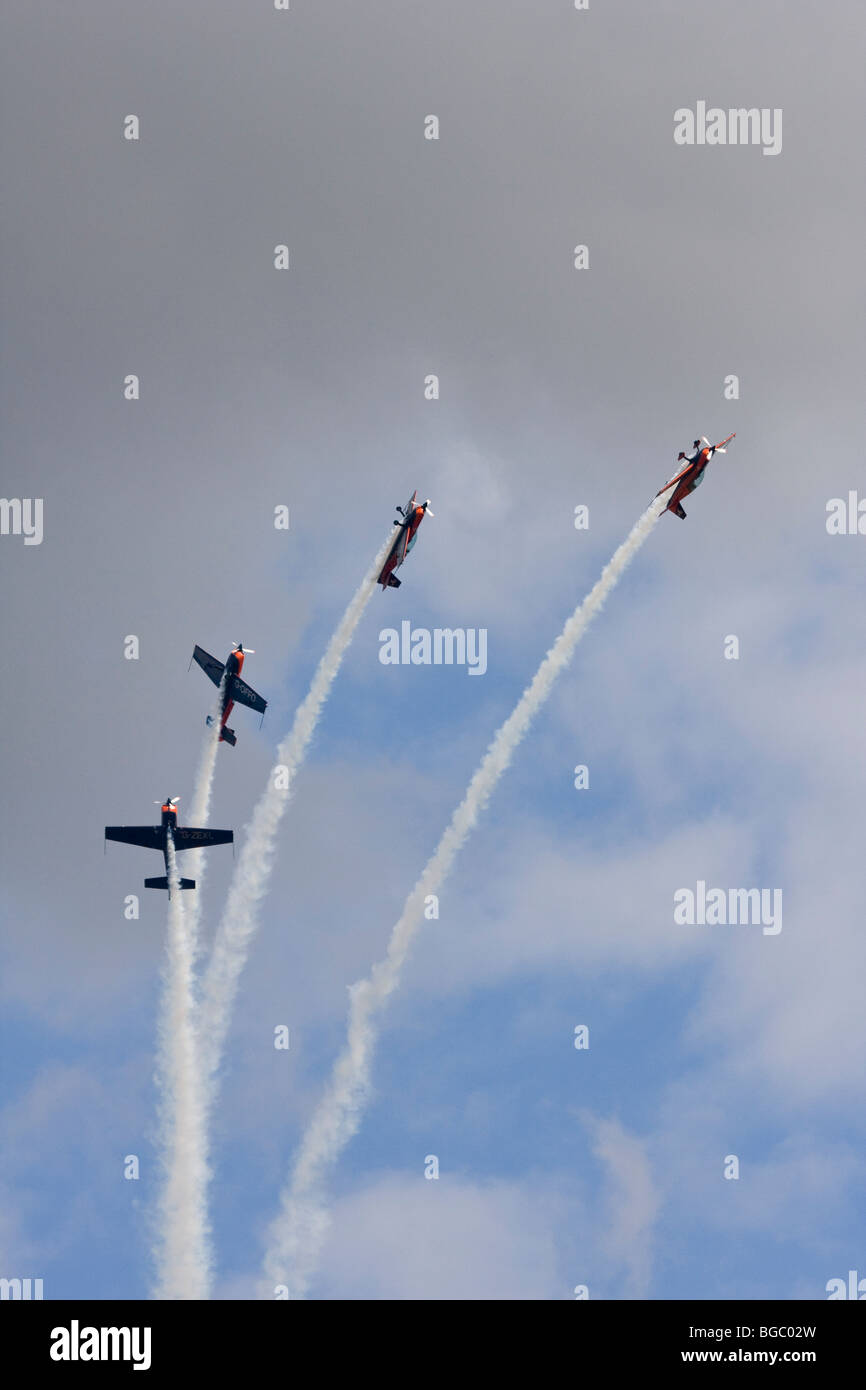 The Blades Aerobatic team flying Extra 300 LP aircraft Stock Photo - Alamy