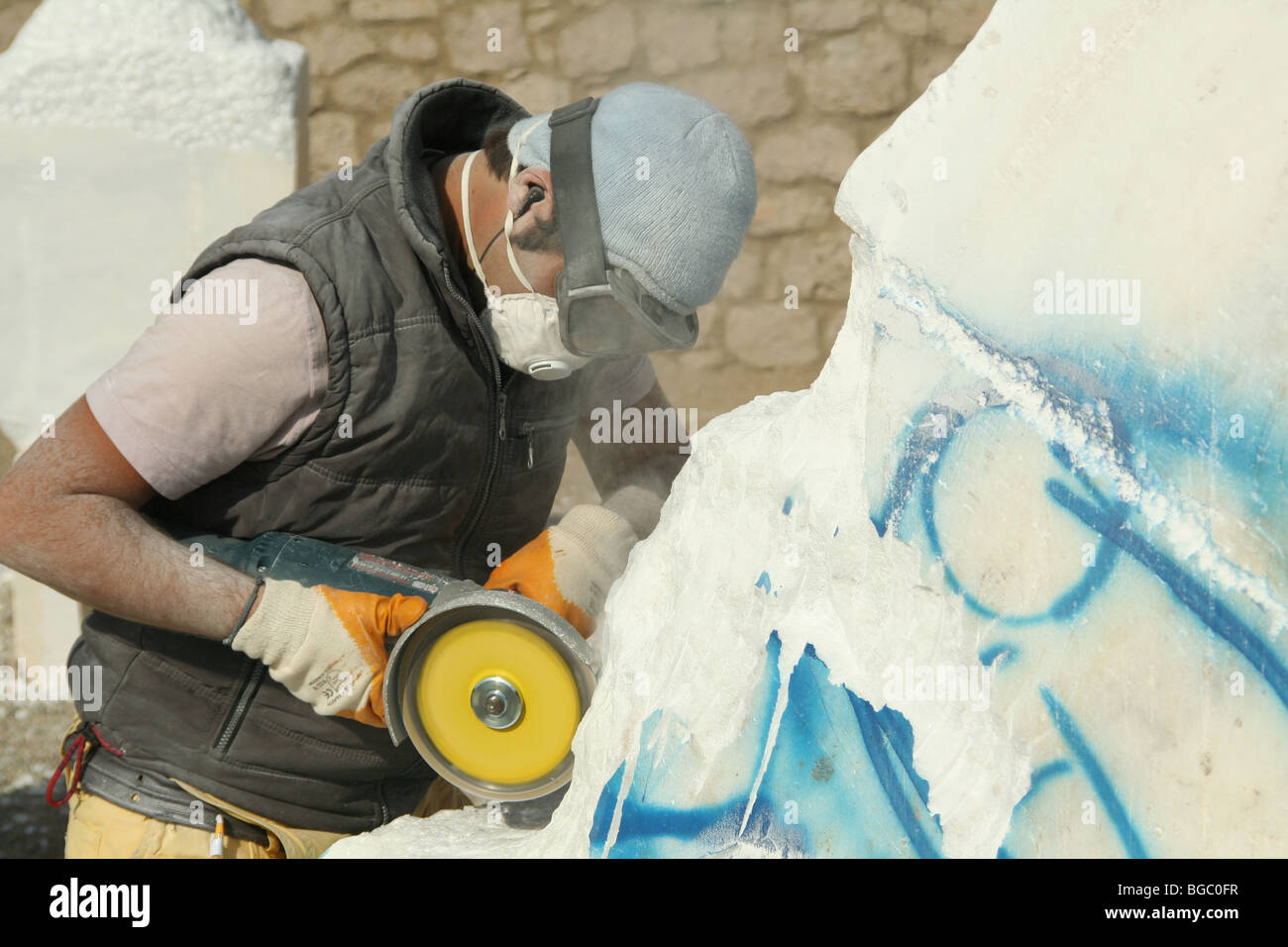 young sculptor working with marble Stock Photo - Alamy