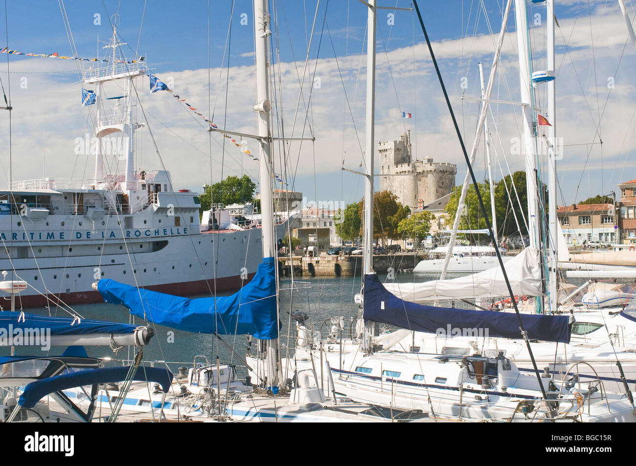 La Rochelle harbour with museum boat and Saint Nicolas Tower , Charente ...