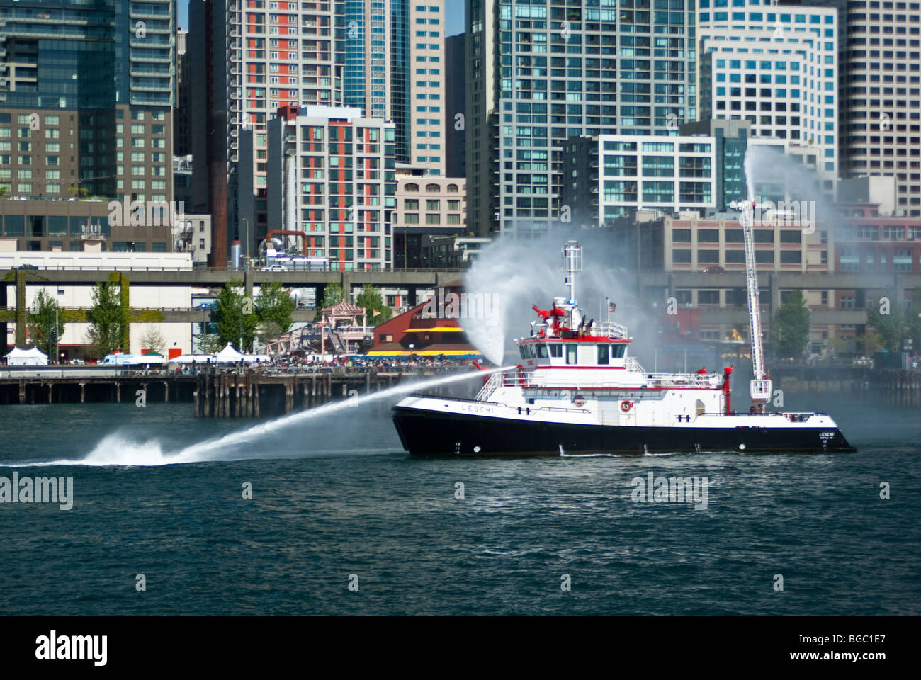 USA, Washington, Seattle. Fireboat Leschi demonstrates firefighting ...