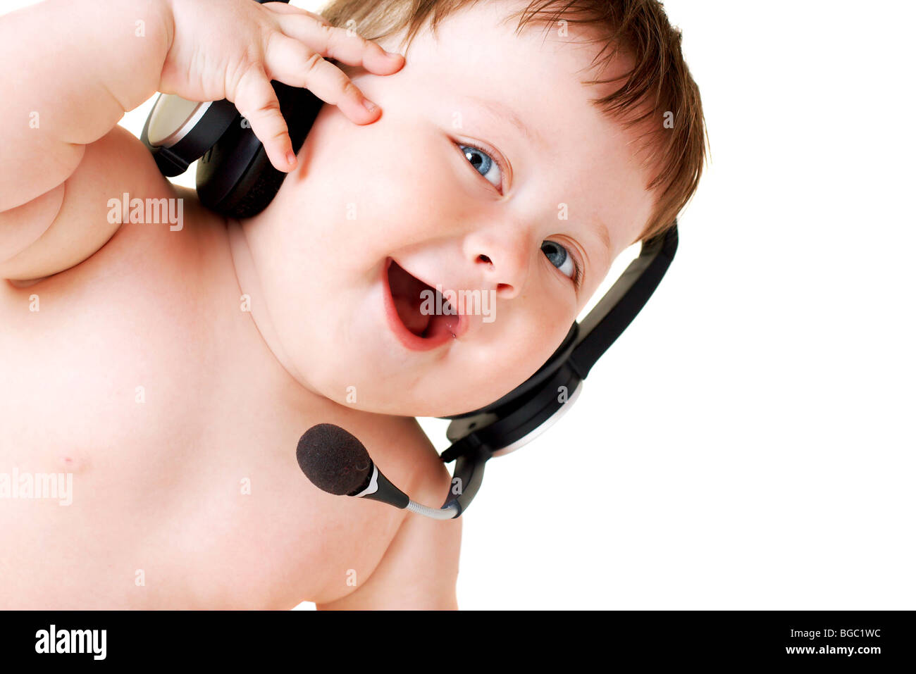 portrait of baby with headset on white background Stock Photo - Alamy