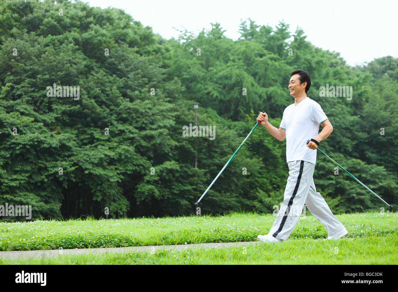 Black man walking side view hi-res stock photography and images - Alamy