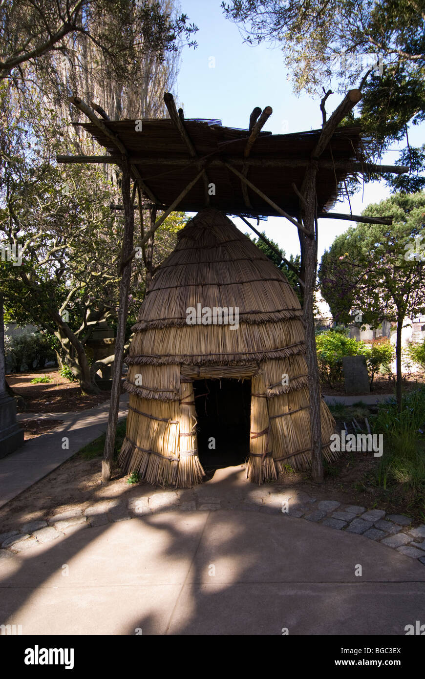 California: San Francisco. Mission Dolores, Indian tule house in garden ...