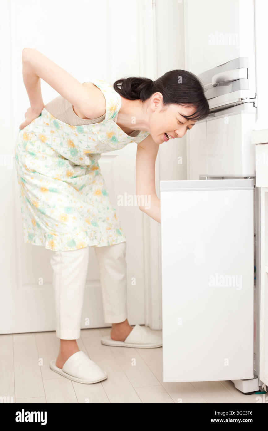 Mature woman exhausted Stock Photo - Alamy