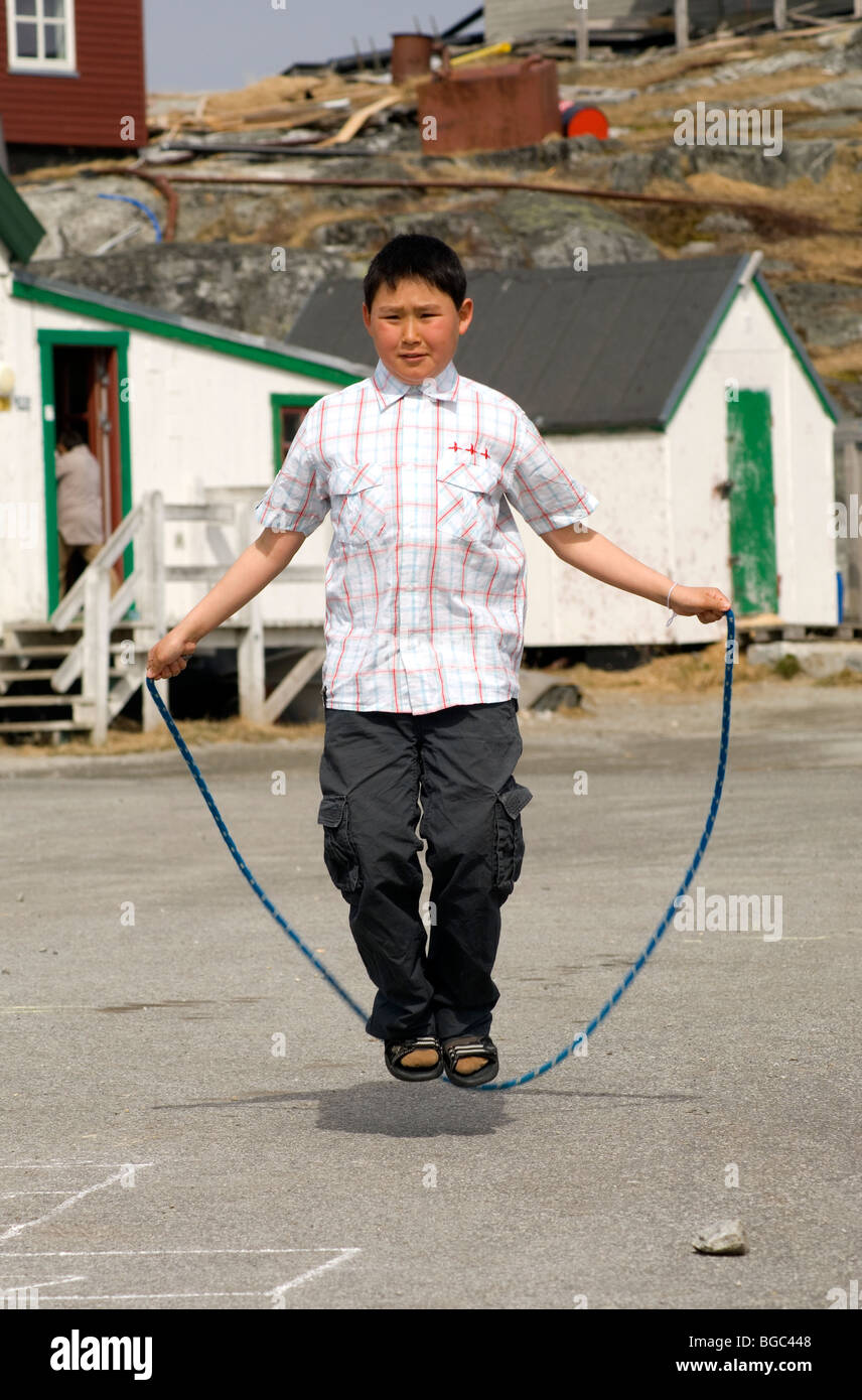 Young boy jumping with rope Stock Photo - Alamy