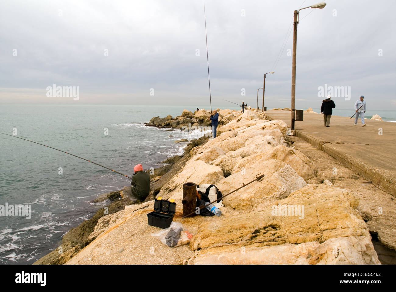fishing and walking at Byblos Shore North Beirut Lebanon Stock Photo ...