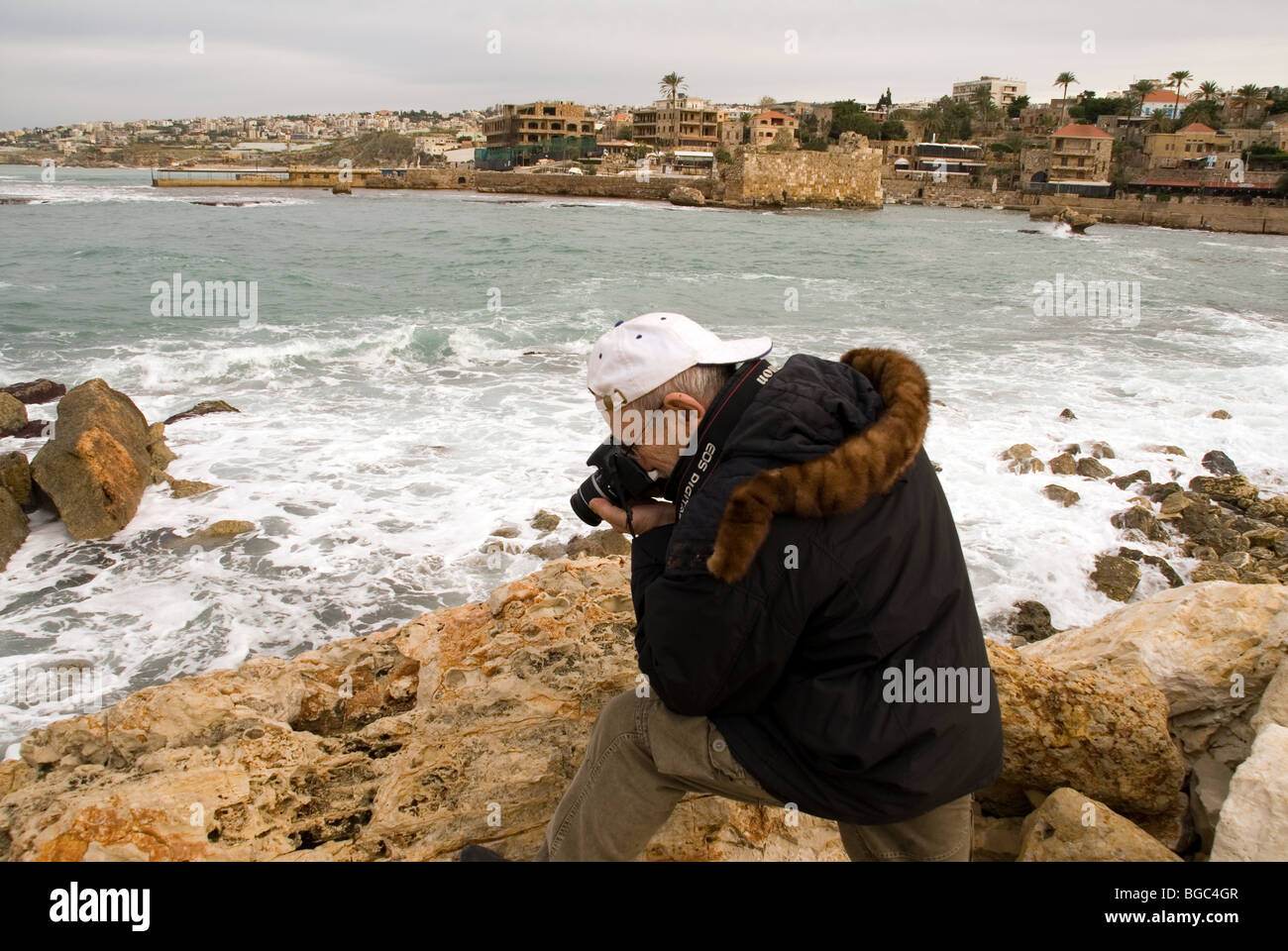 tourist man taking photo at Byblos shore North Beirut Lebanon Stock ...