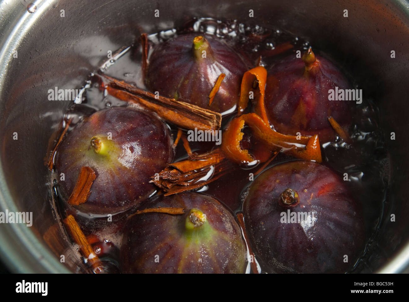 Poached figs with orange UK Stock Photo - Alamy