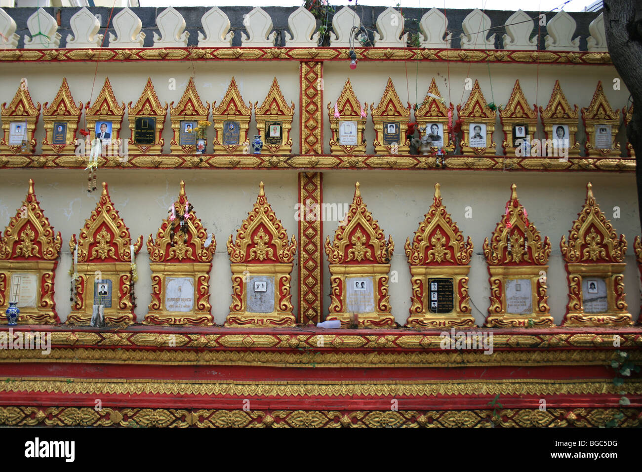 Buddhist memorial wall in Wat Seekan in Bangkok, Thailand Stock Photo ...
