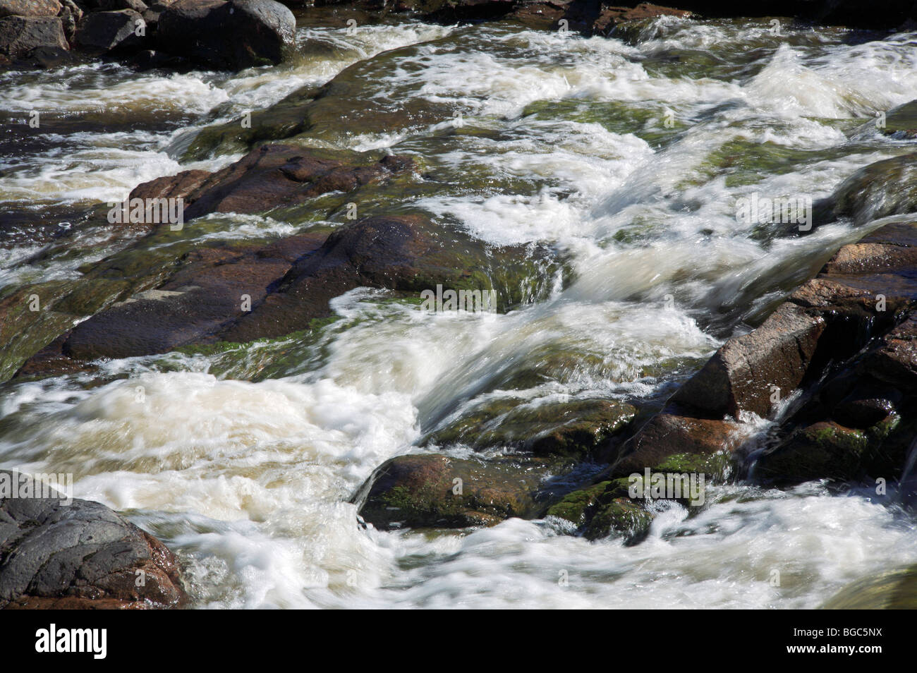 Water tumbling over rocks in the Callater Burn, near Braemar ...
