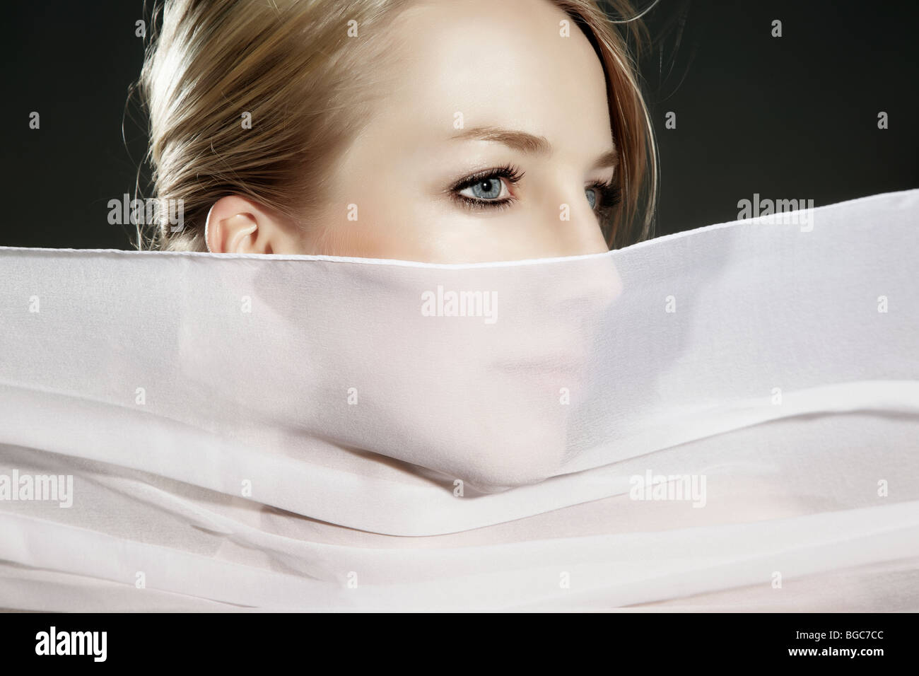 Woman face covered flowing fabric hi-res stock photography and images ...