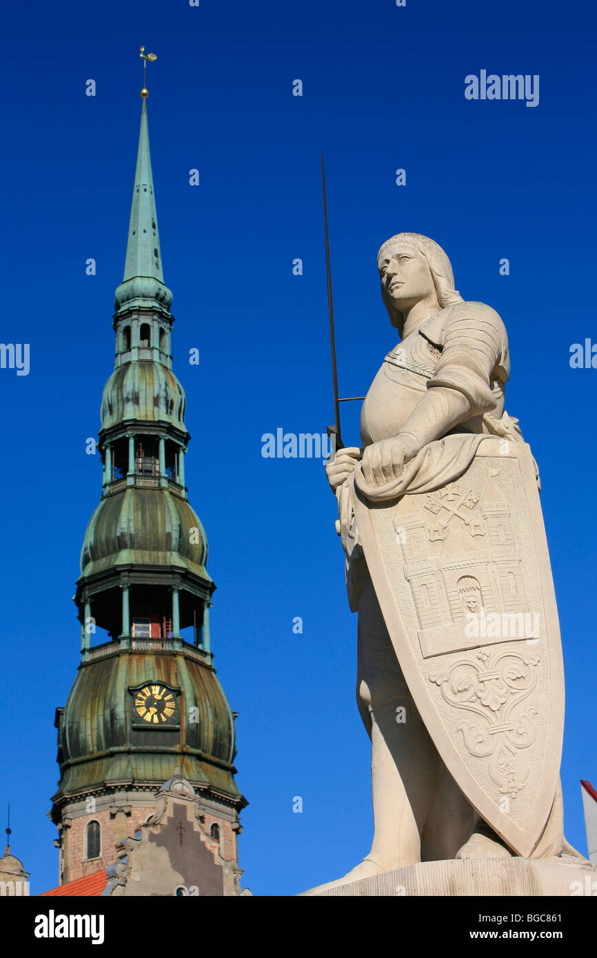 Statue of Saint Roland and the steeple of Saint Peter's Church in Riga ...