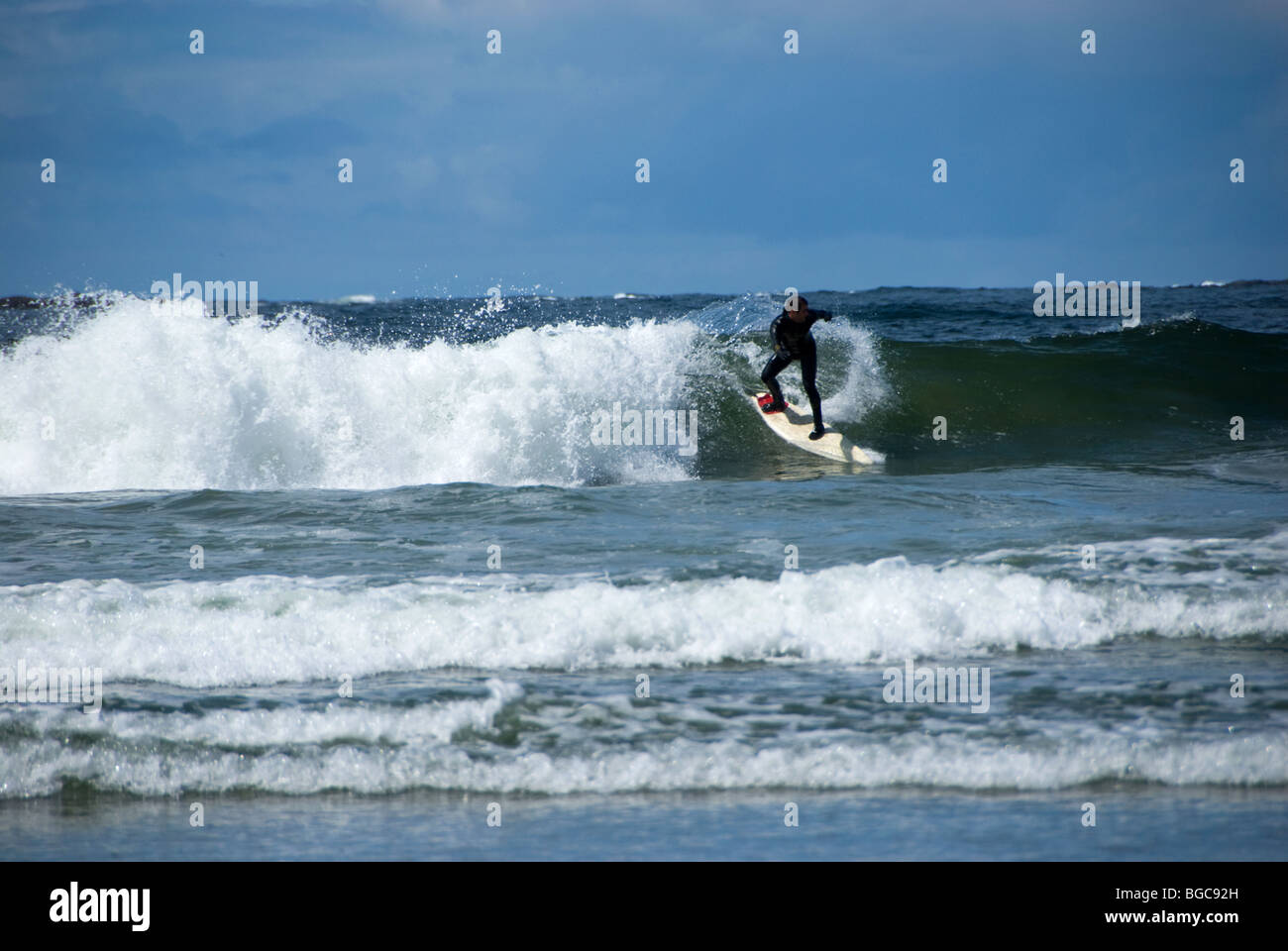 Surfer in tofino BC Stock Photo - Alamy