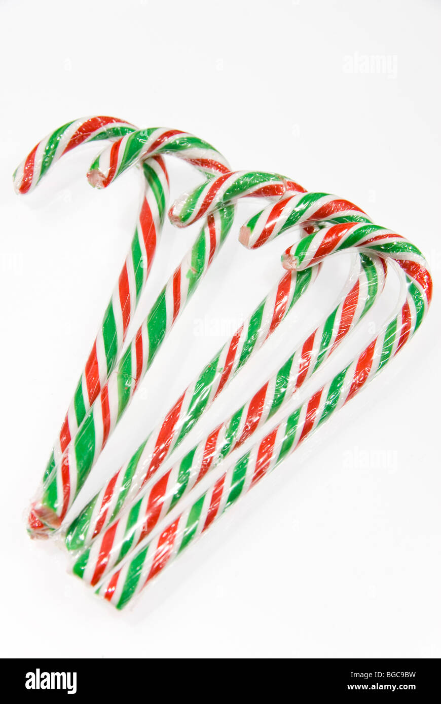 Five Red And Green Striped Christmas Candy Canes Isolated On A White