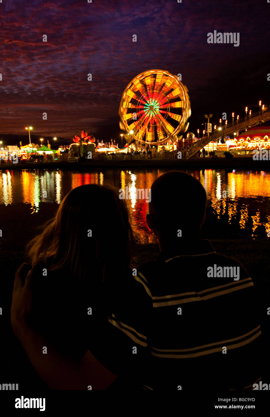 A couple enjoys the view of the South Carolina Coastal Fair in ...
