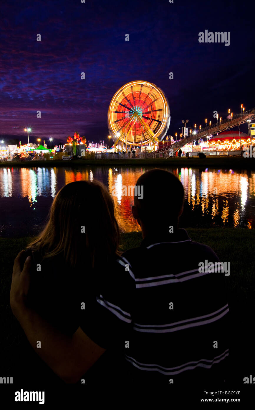 A couple enjoys the view of the South Carolina Coastal Fair in ...